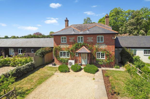 'Exceptionally pretty' former farmhouse in rural development for sale ...