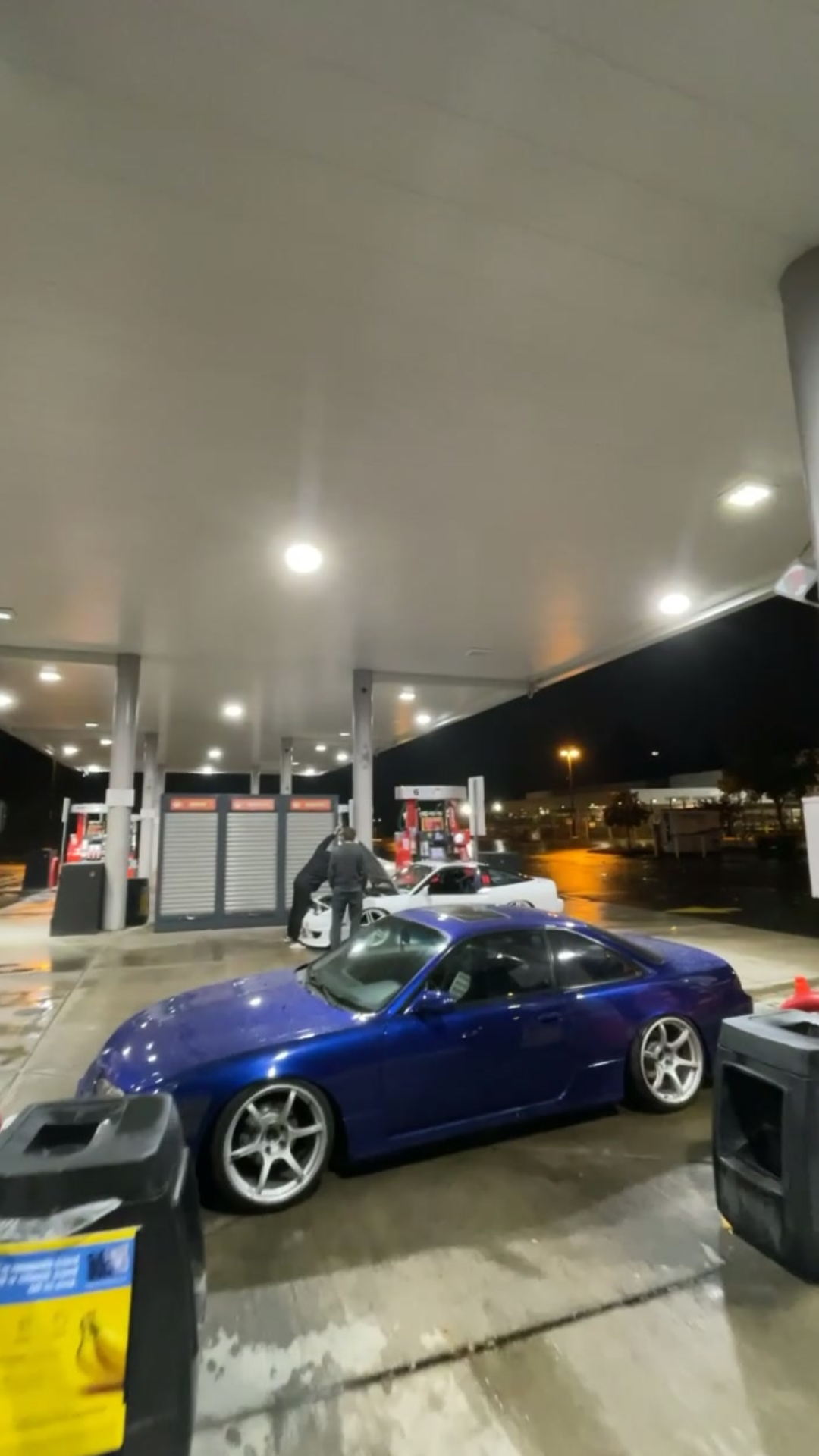 JDM blue coupe at gas station night scene real street vibes