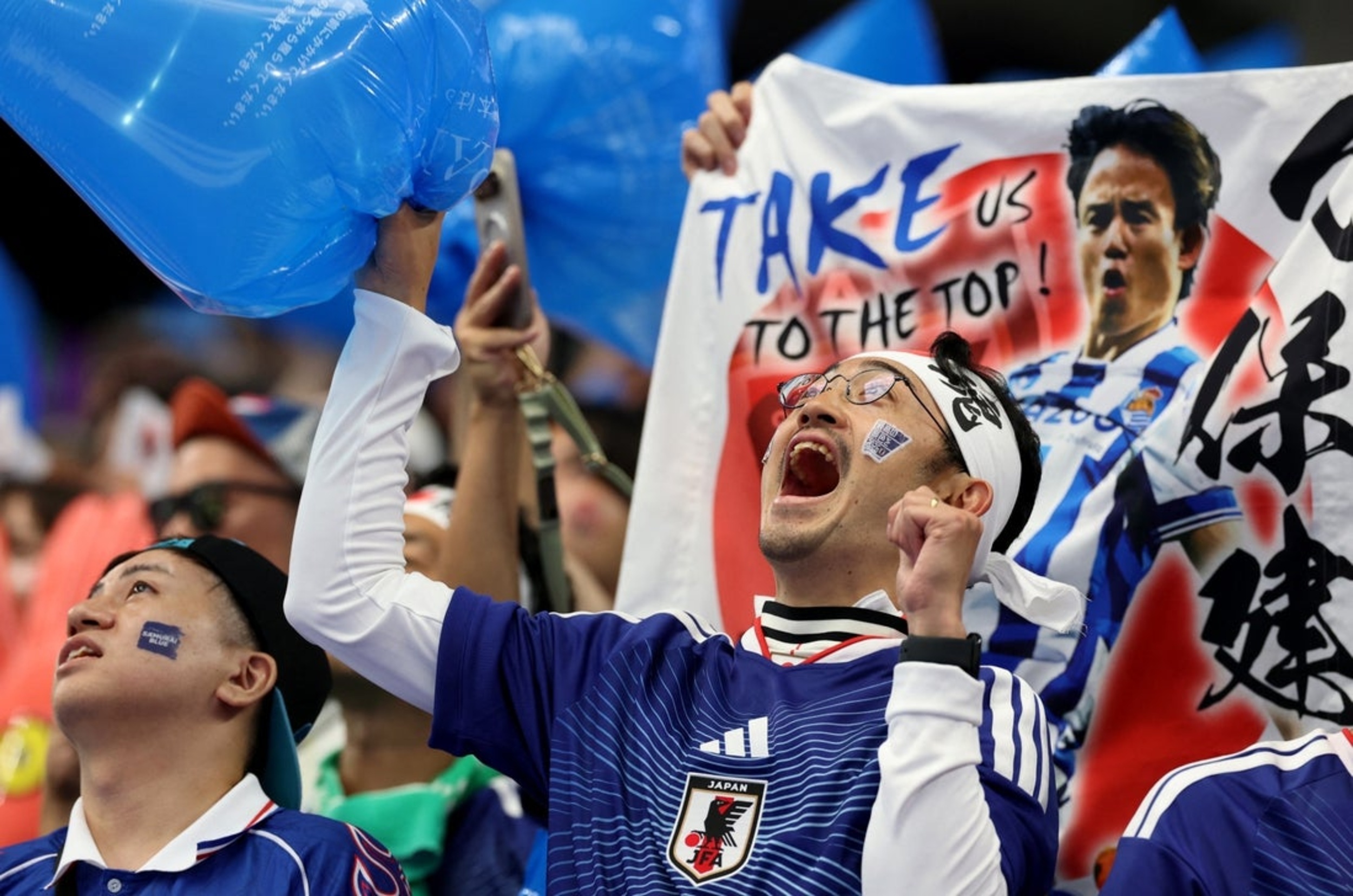Continuing tradition, fans of Japan clean up postgame
