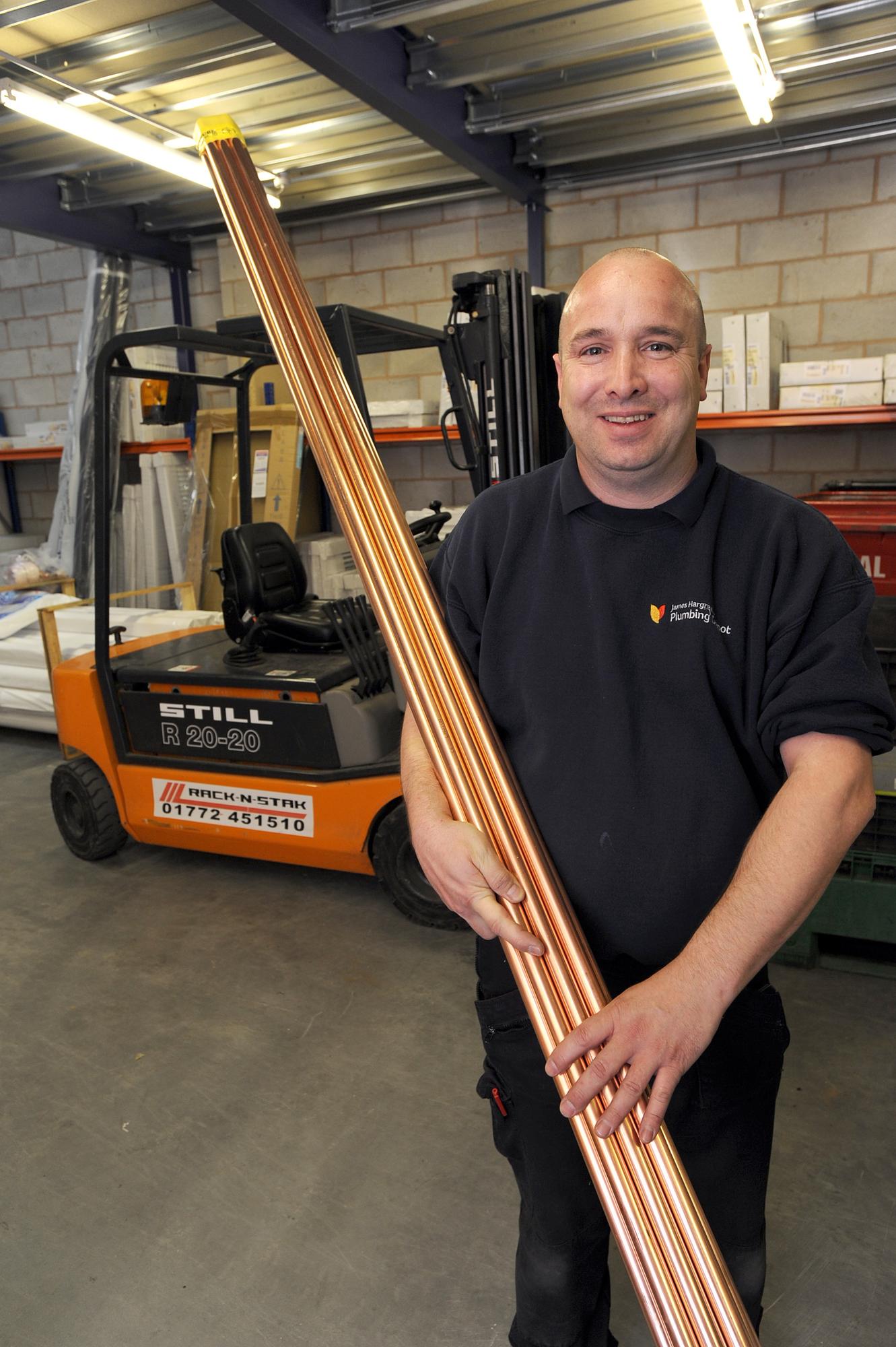 Staff from four Wigan businesses first pictured in spring 2012
