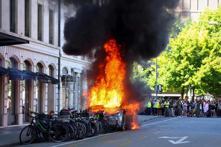 Tear gas, burning Tesla and smashed windows: 20,000 protest G7 summit ...