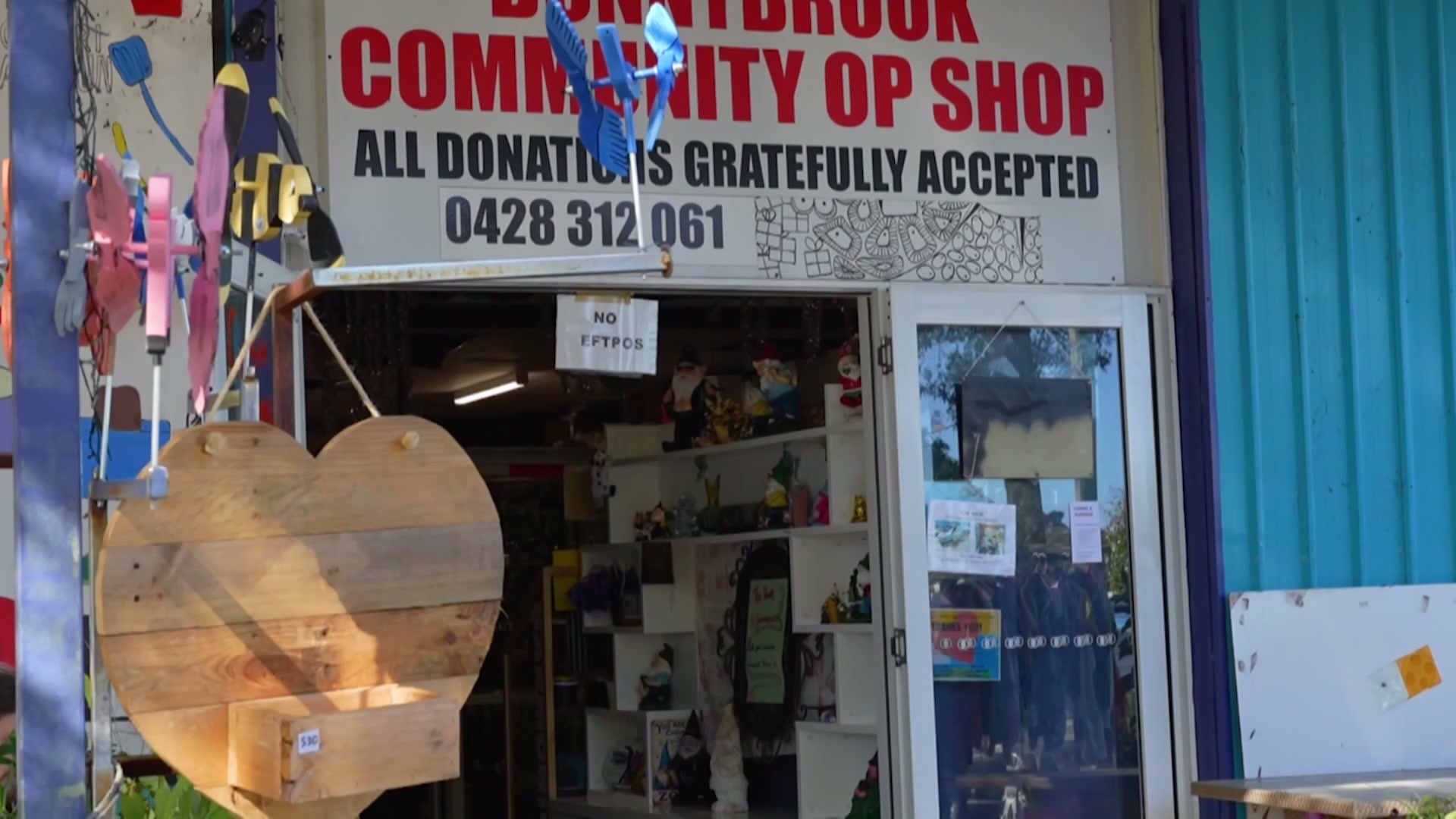 Woman ditches custom wedding gown for $90 op shop find