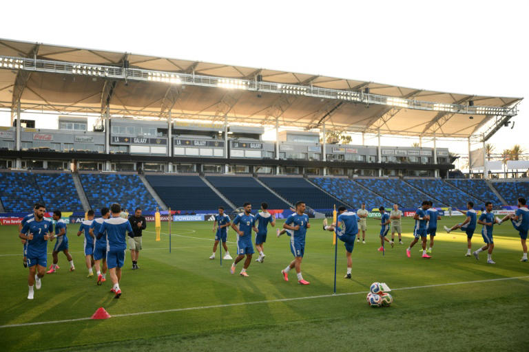 Iran take center stage at World Cup as Spain make bow