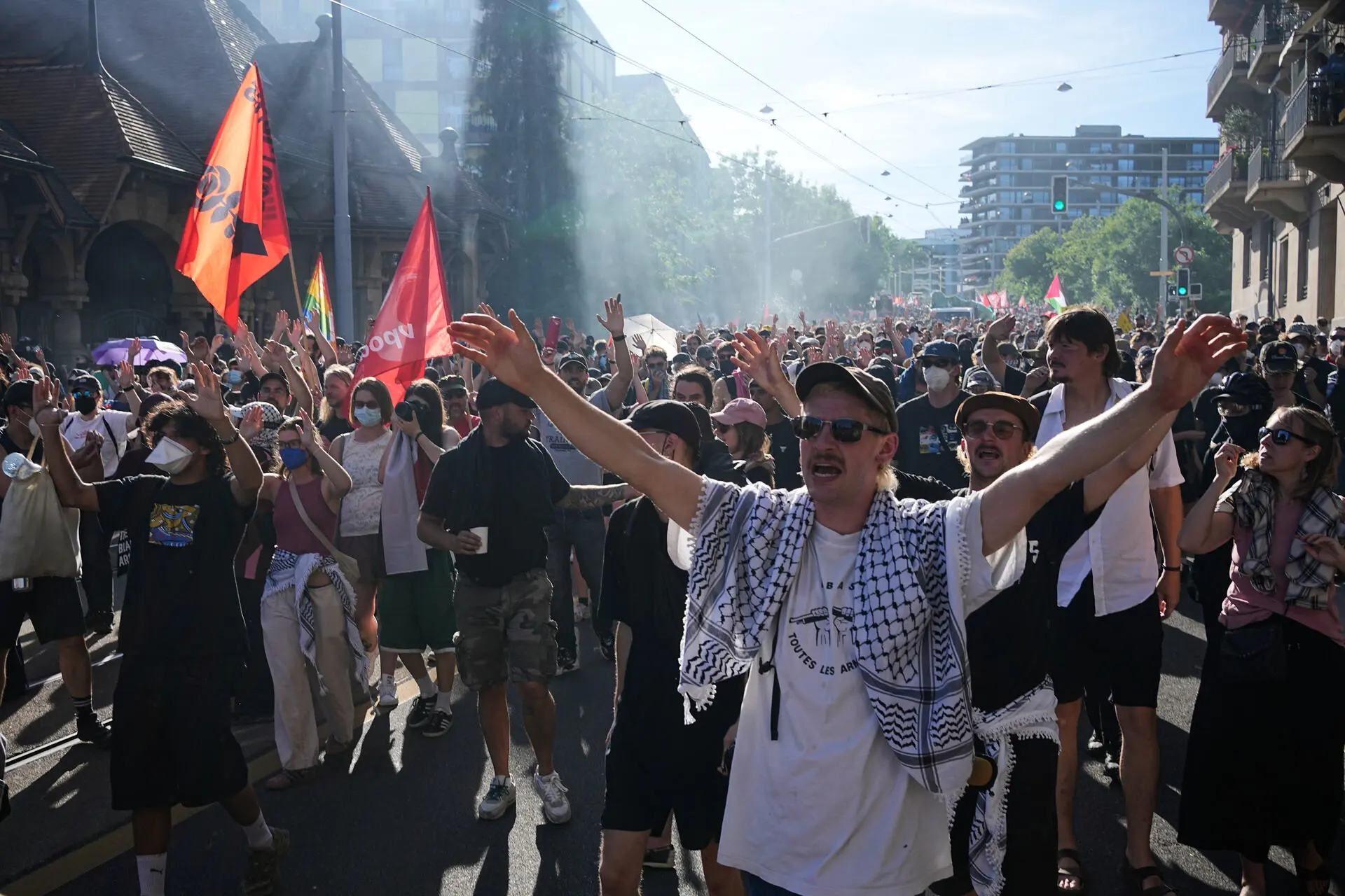 Tear gas, burning Tesla and smashed windows: 20,000 protest G7 summit ...