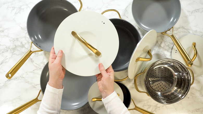 Goodbye cluttered cabinets: There's a smarter way to organize pot lids