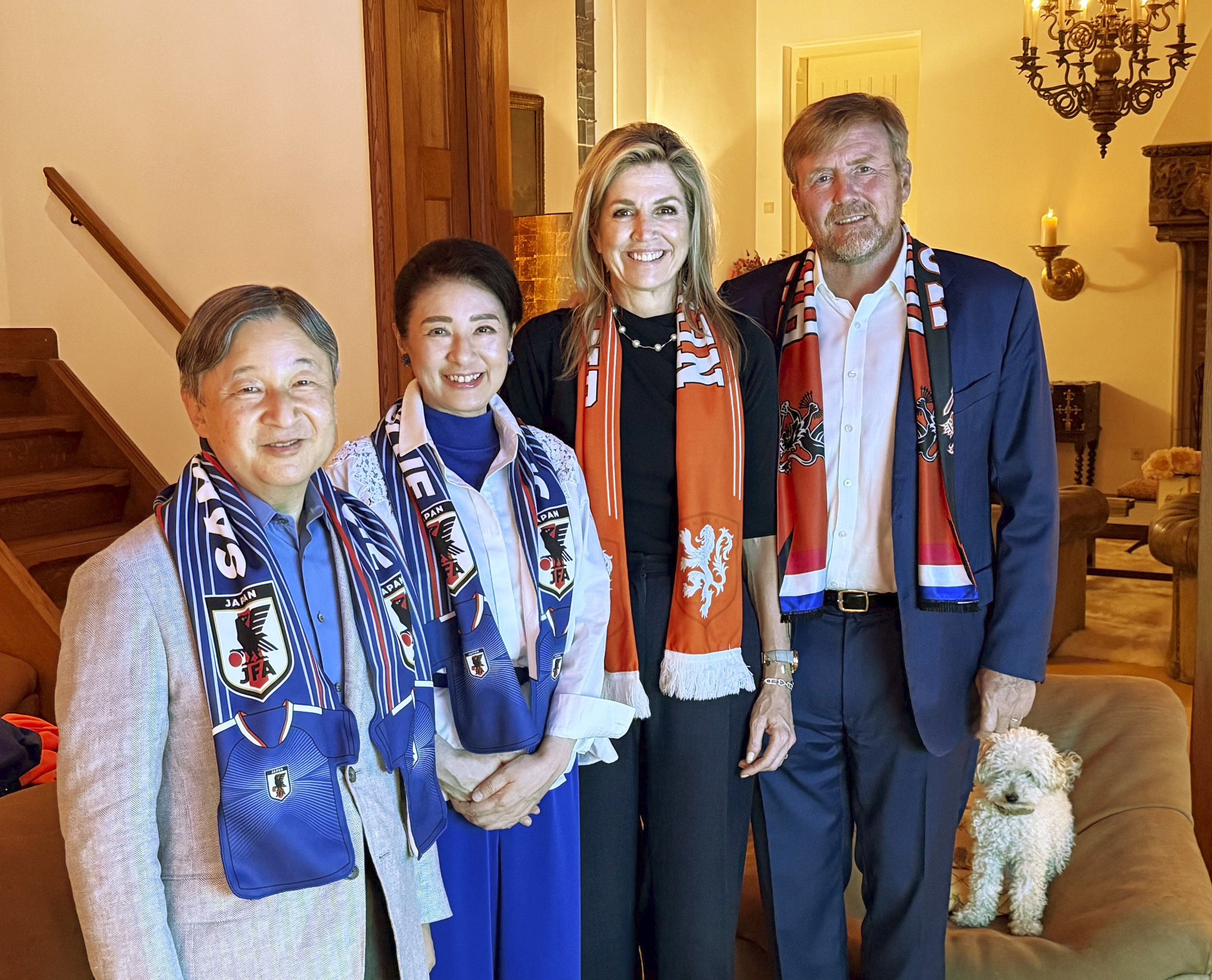 Japan's emperor, empress watch World Cup match with Dutch royals