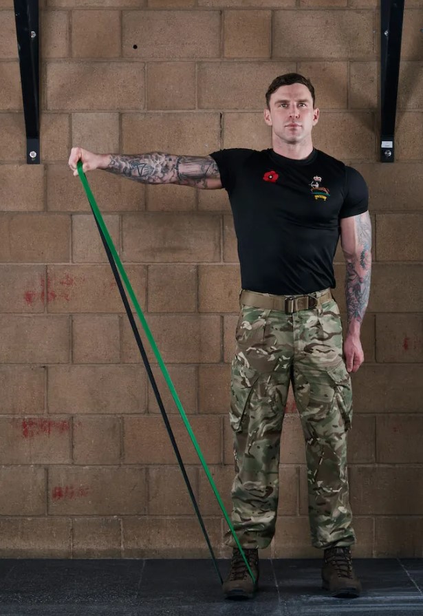Prime yourself for working out with this full-body resistance band warm-up