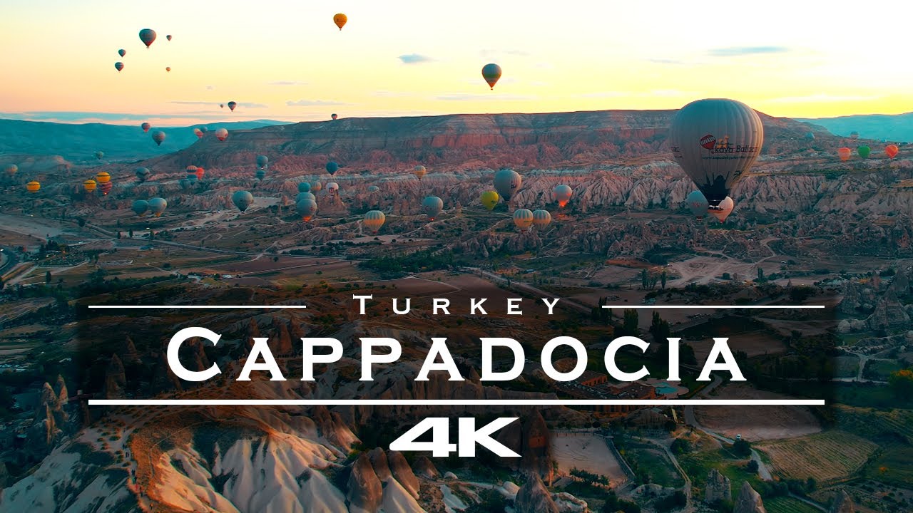 Cappadocia from above with balloons and valleys