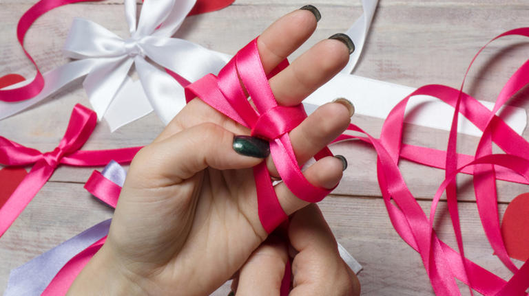 Repurpose old ribbon into a stunning home decor piece for your front door