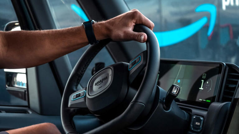 Amazon’s Rivian vans cut A/C for delivery drivers over an open door ...