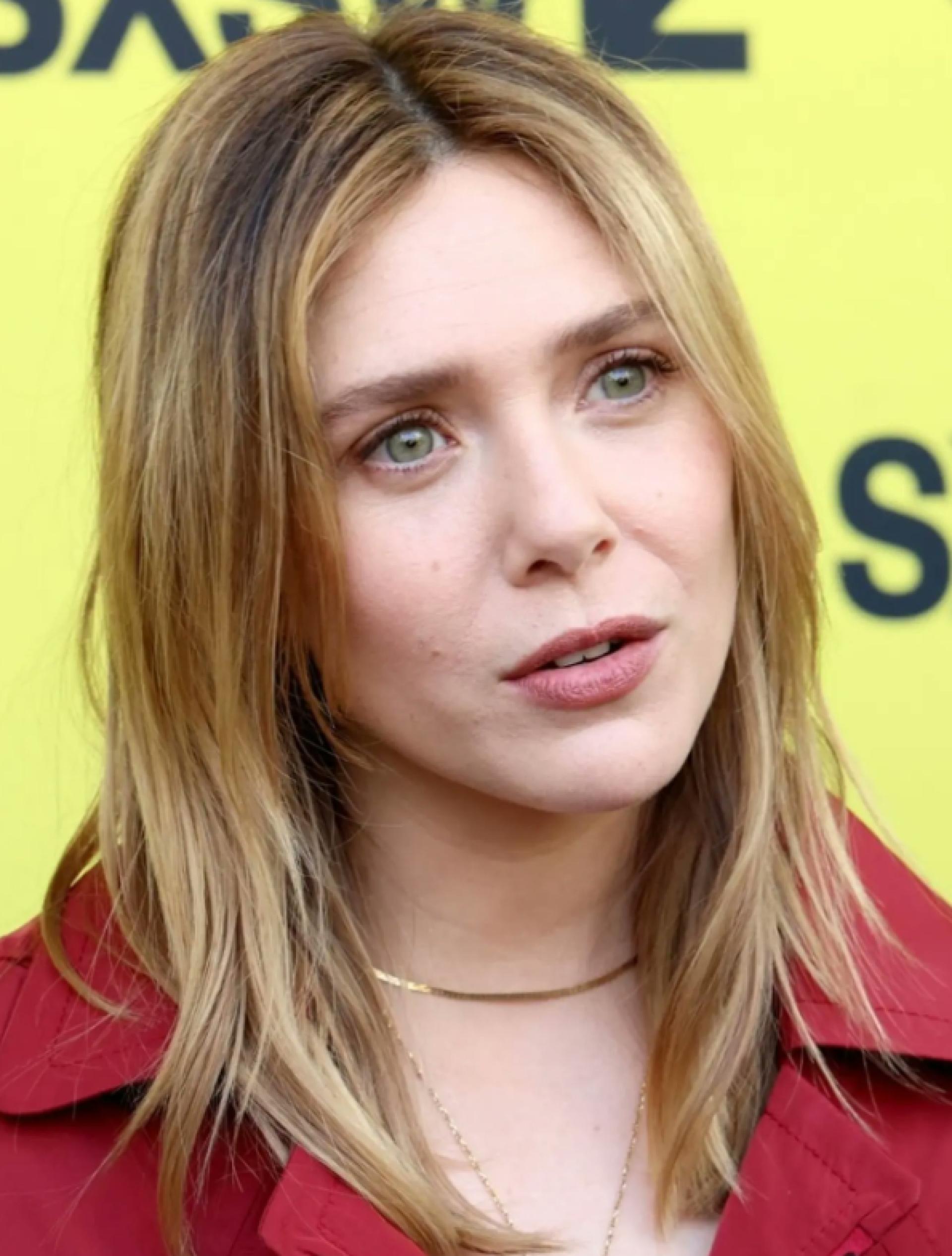 Elizabeth Olsen reportedly expecting first child after revealing baby bump