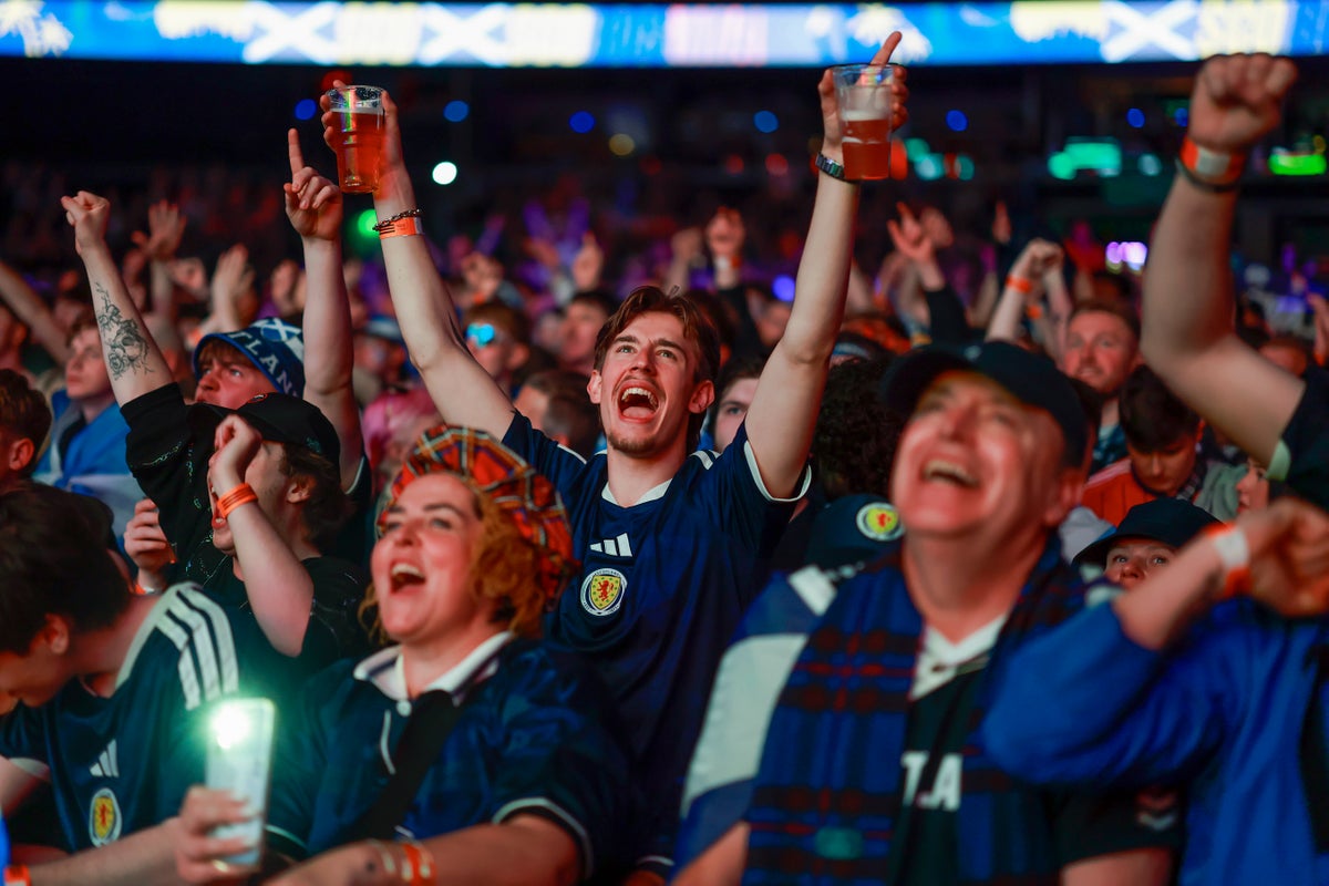 Scotland fans erupt in joyous celebrations after World Cup return