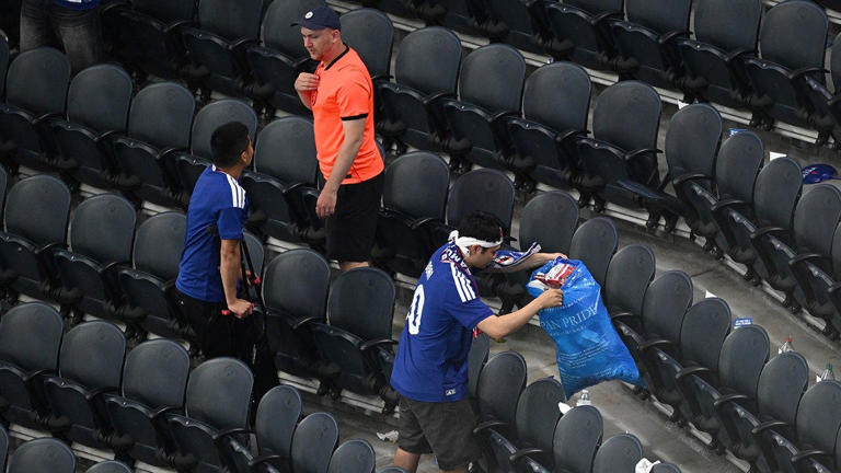 Japanese World Cup fans clean up stadium with NFL quarterback after ...