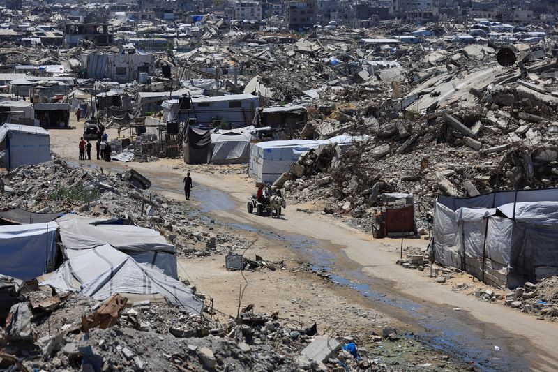 Israeli fire kills four in Gaza, mediators hold more ceasefire talks