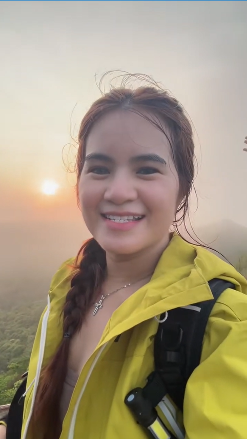 Girl enjoying a beautiful view in a peaceful moment