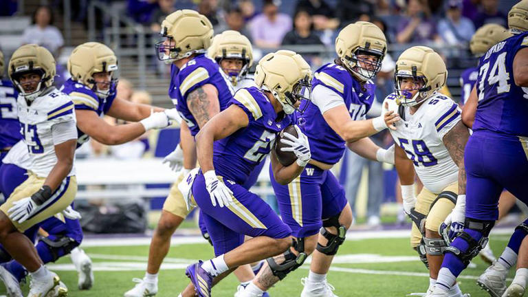 McMahan brings big body to run the ball for UW