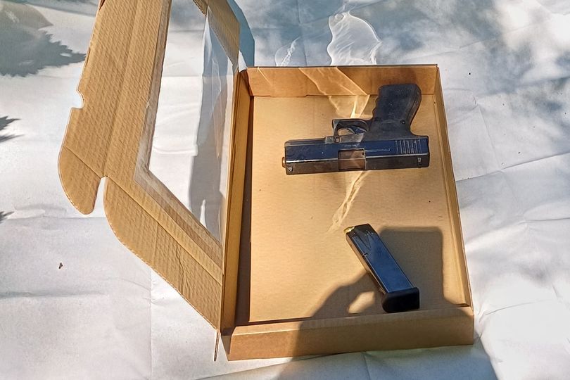 Gun and ammunition found hidden in bin bag