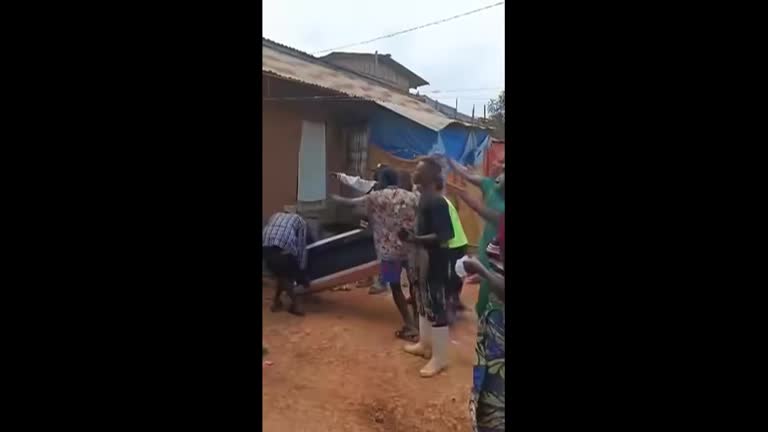 Police use tear gas, fire warning shots as Ebola medics try to recover ...