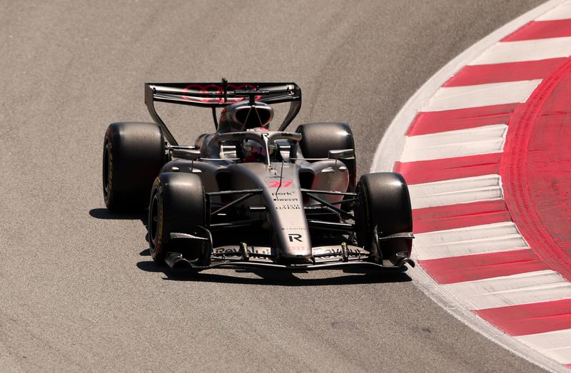 Motor racing-airborne gravel blamed for Hulkenberg's Barcelona retirement