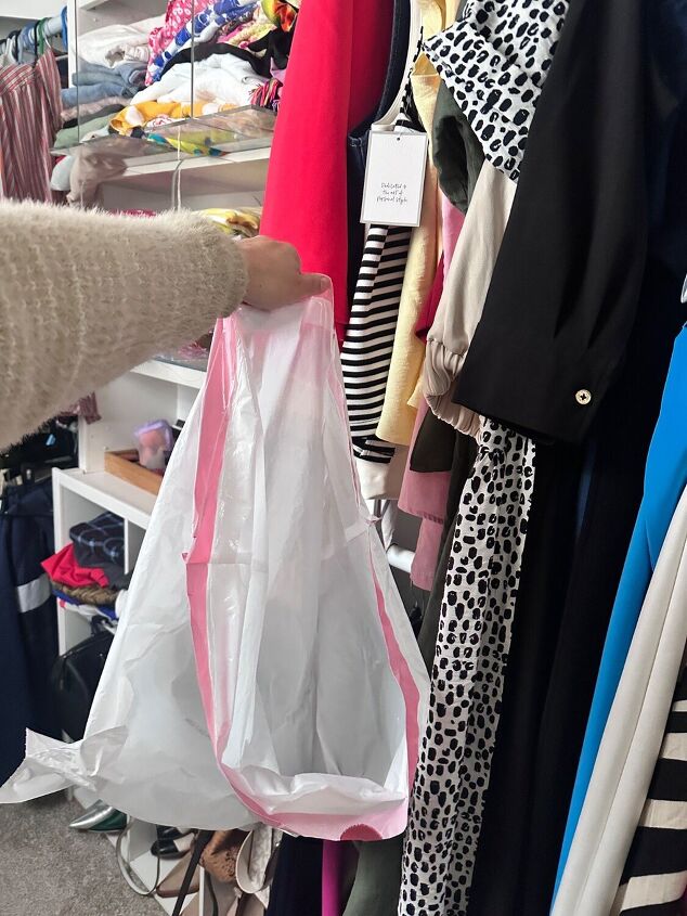Wardrobe on the go: The trash bag hanger hack