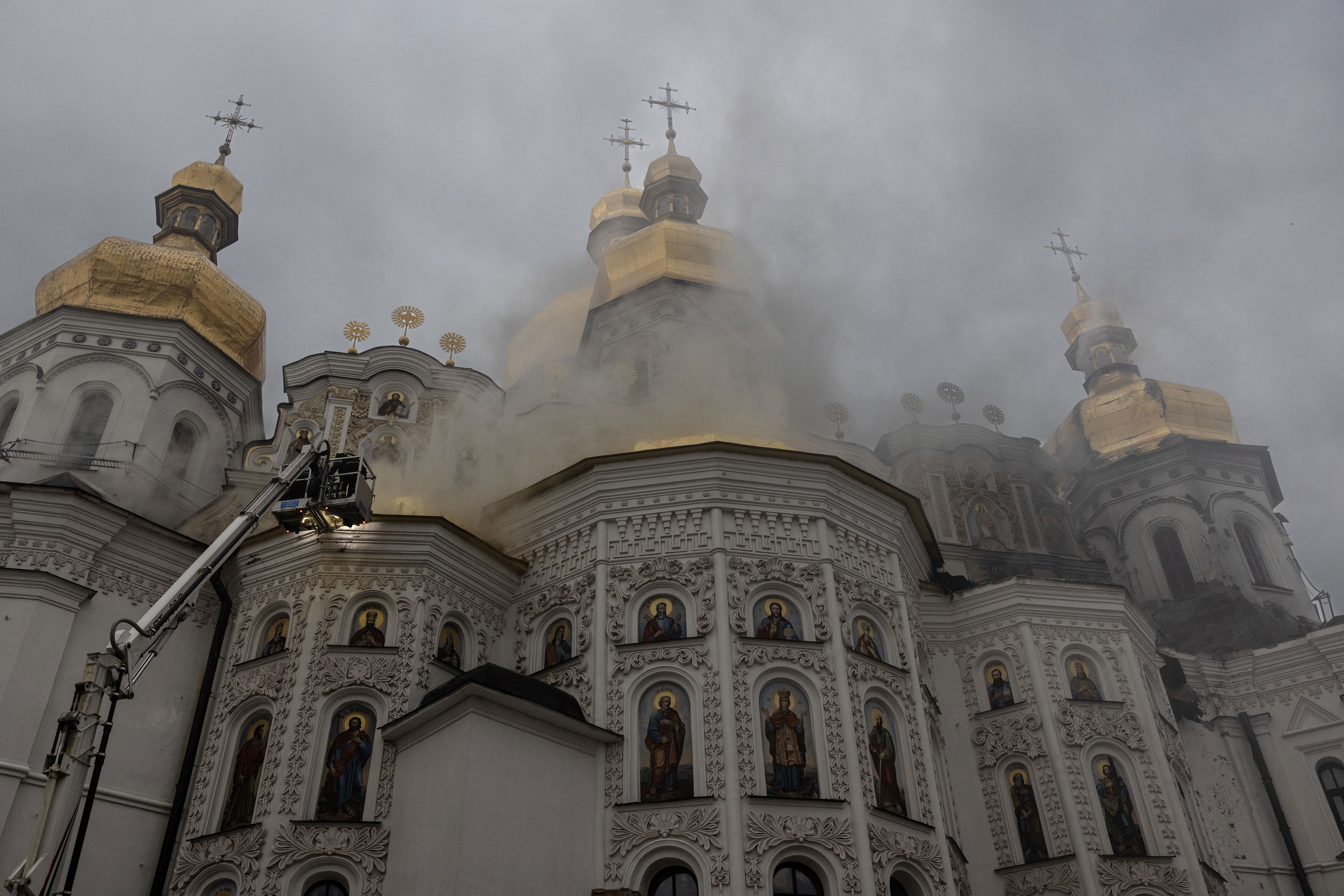 Russian attack kills at least five and damages historic monastery in Kyiv