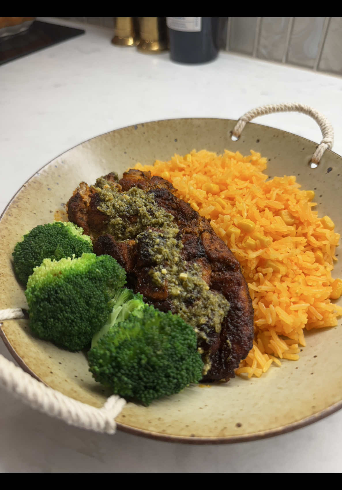 Making delicious butter chicken with fragrant orange rice and green ...
