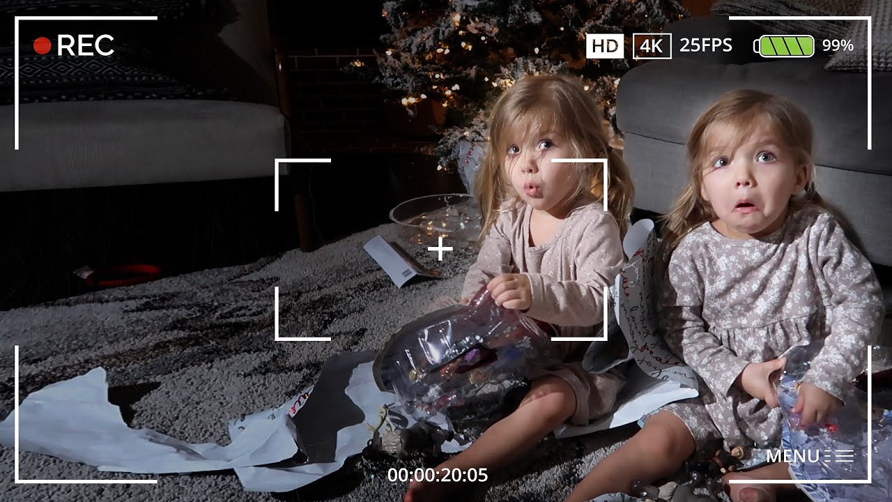 Hidden camera catches young twins opening Christmas gifts early