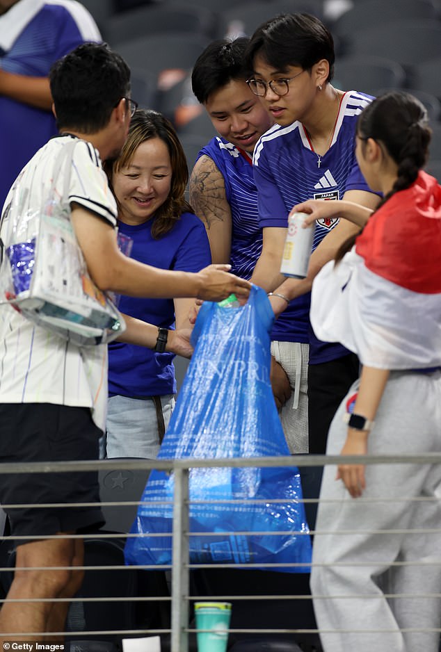 Classy Japan fans clean up after themselves following draw against the ...