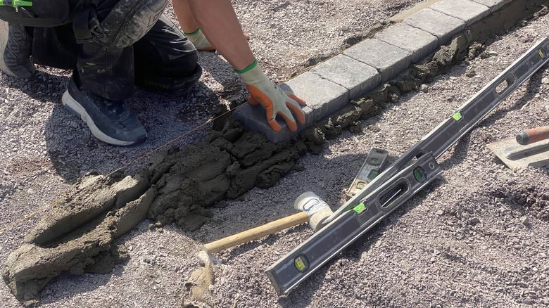Ditch pricey natural stone & meet the stylish driveway edging you can ...