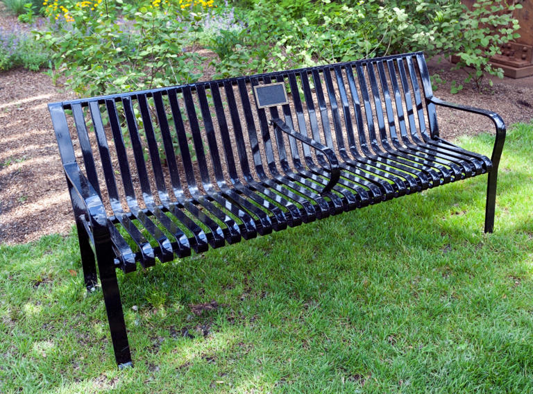 Late husband and wife get memorial bench—different plaques say it all