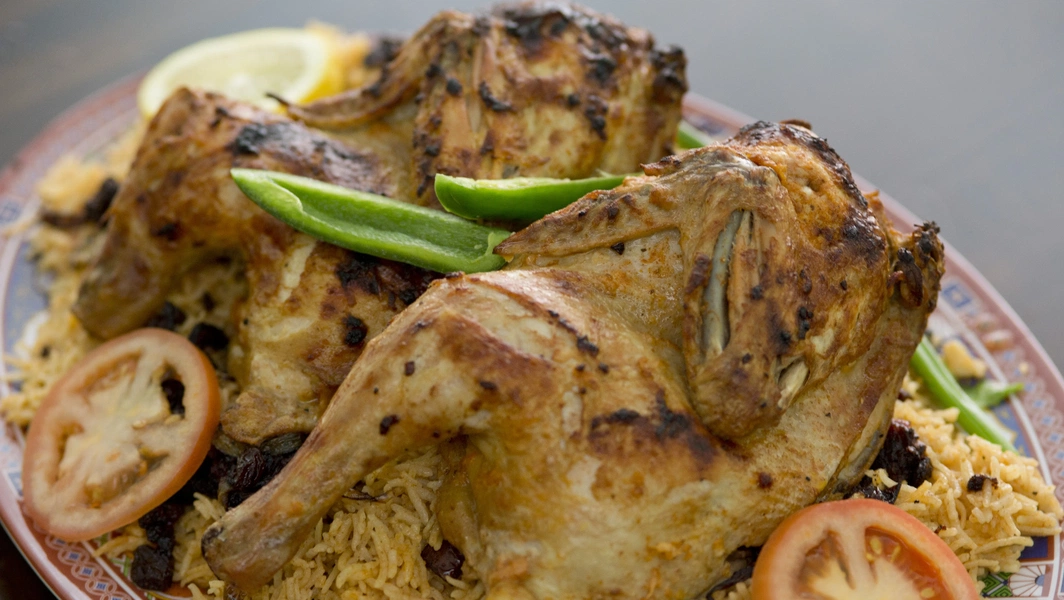 Spice-filled chicken journeys across cultures