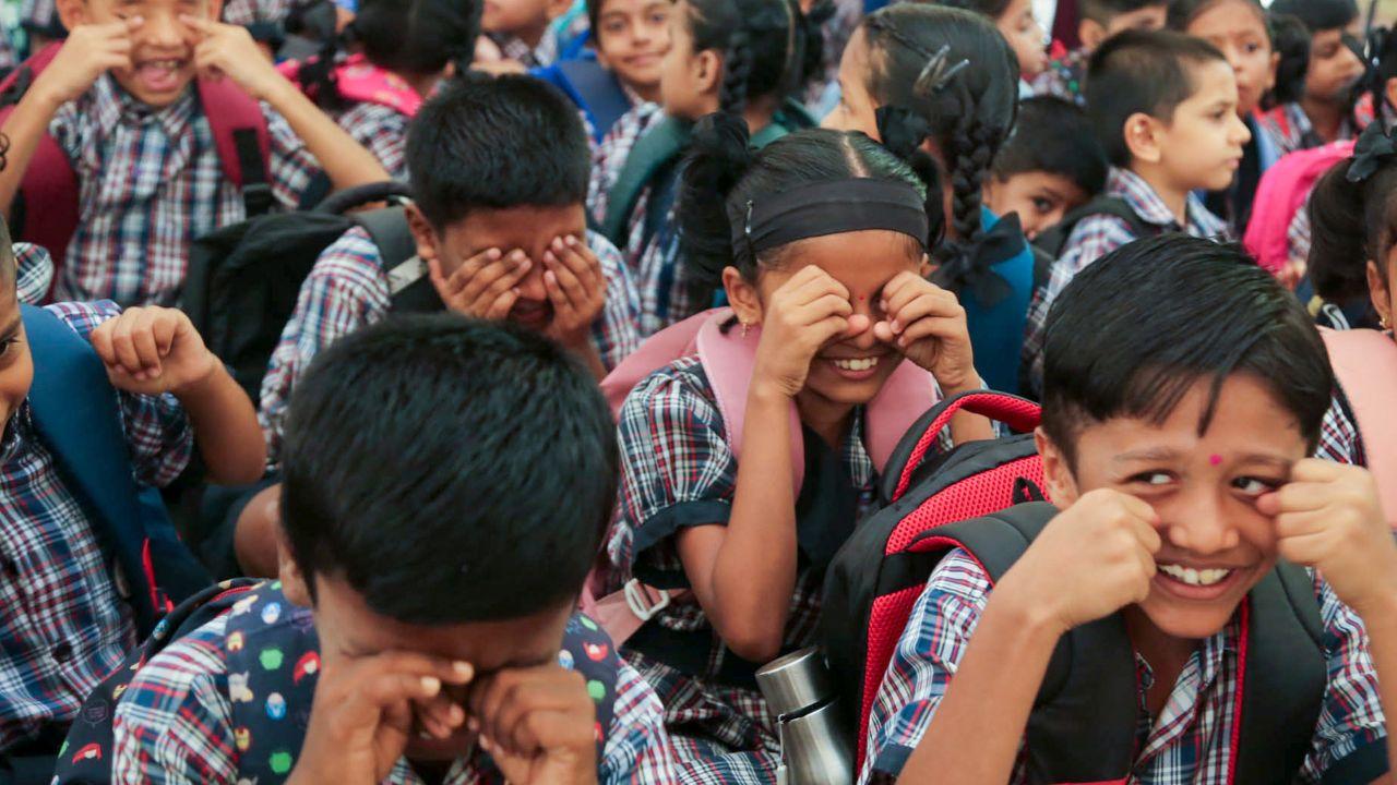 In photos Maharashtra school kids resume classes after summer vacation