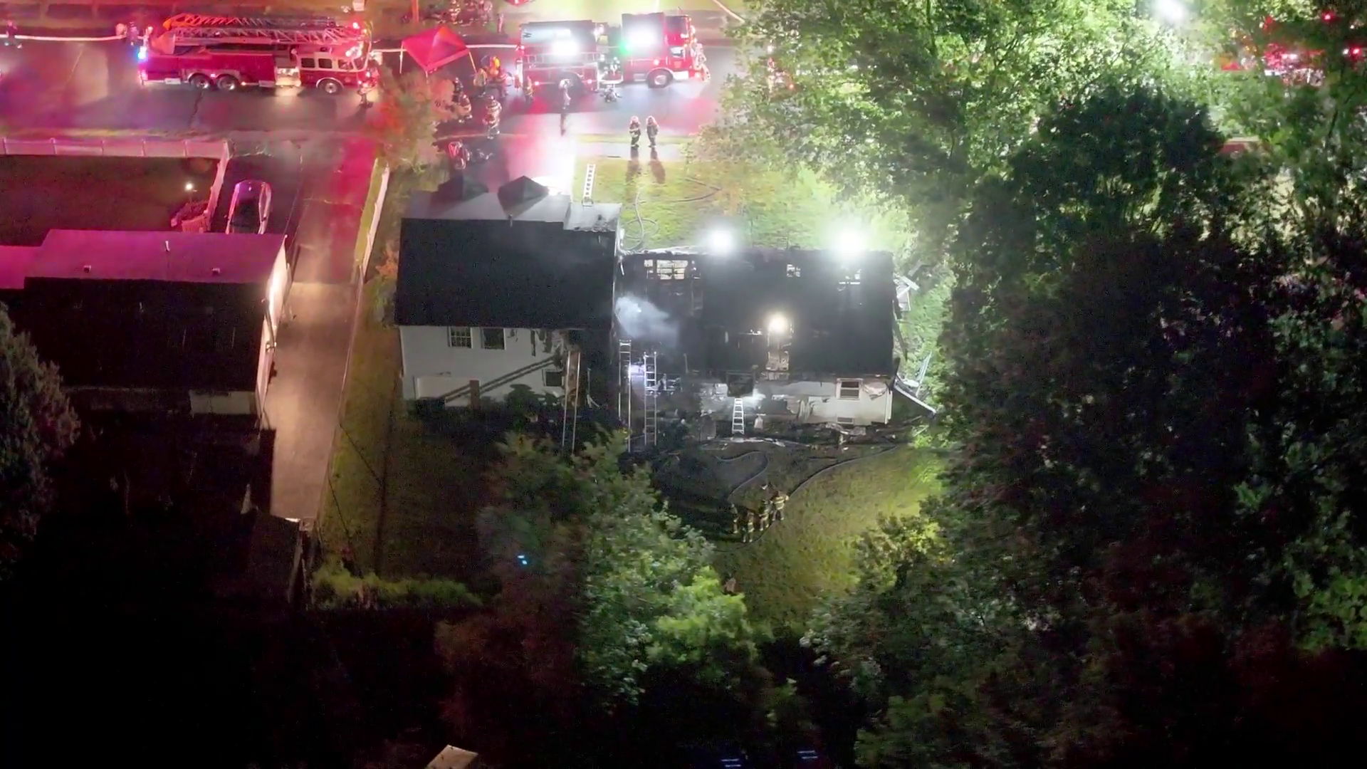 Sisters die after fire rips through Mass. house