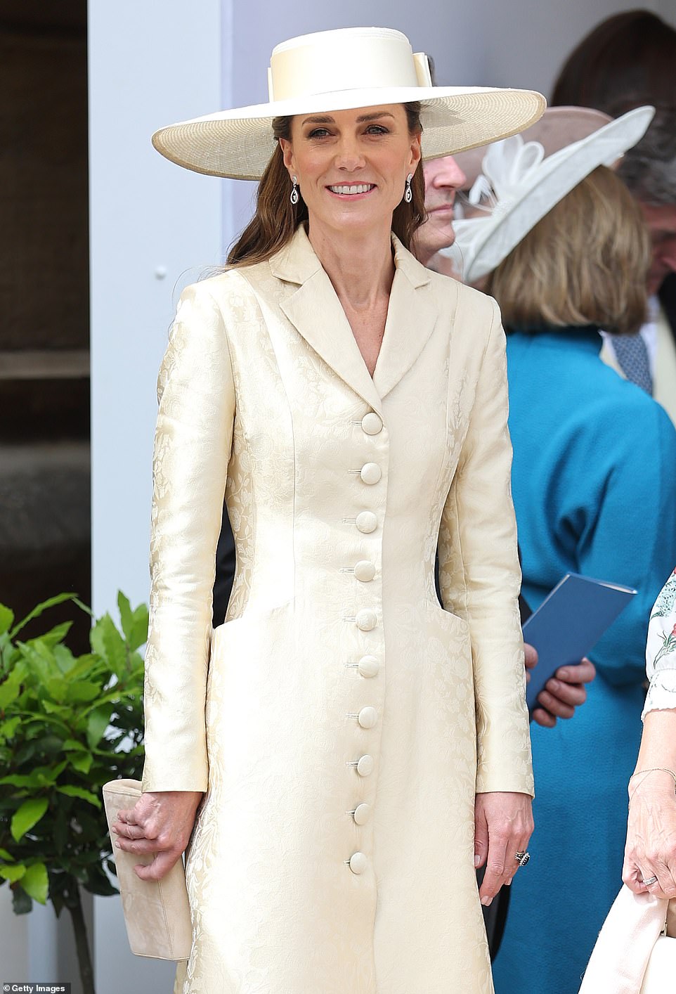 Kate champions British fashion in custom silk damask coat dress