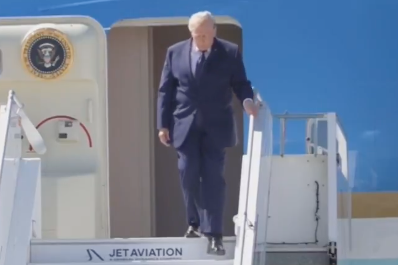 Moment sleepless Trump gingerly steps down Air Force One stairs after ...
