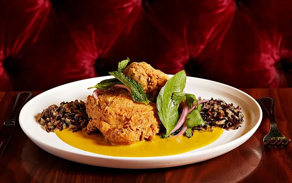 Spice-filled chicken journeys across cultures