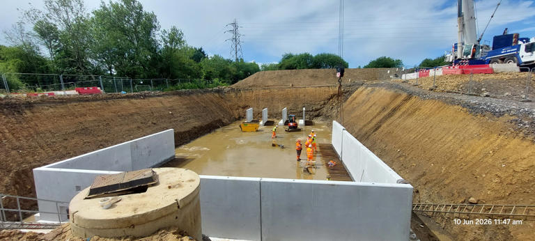 Pictures show construction of underground water tank at Dawsons Corner ...