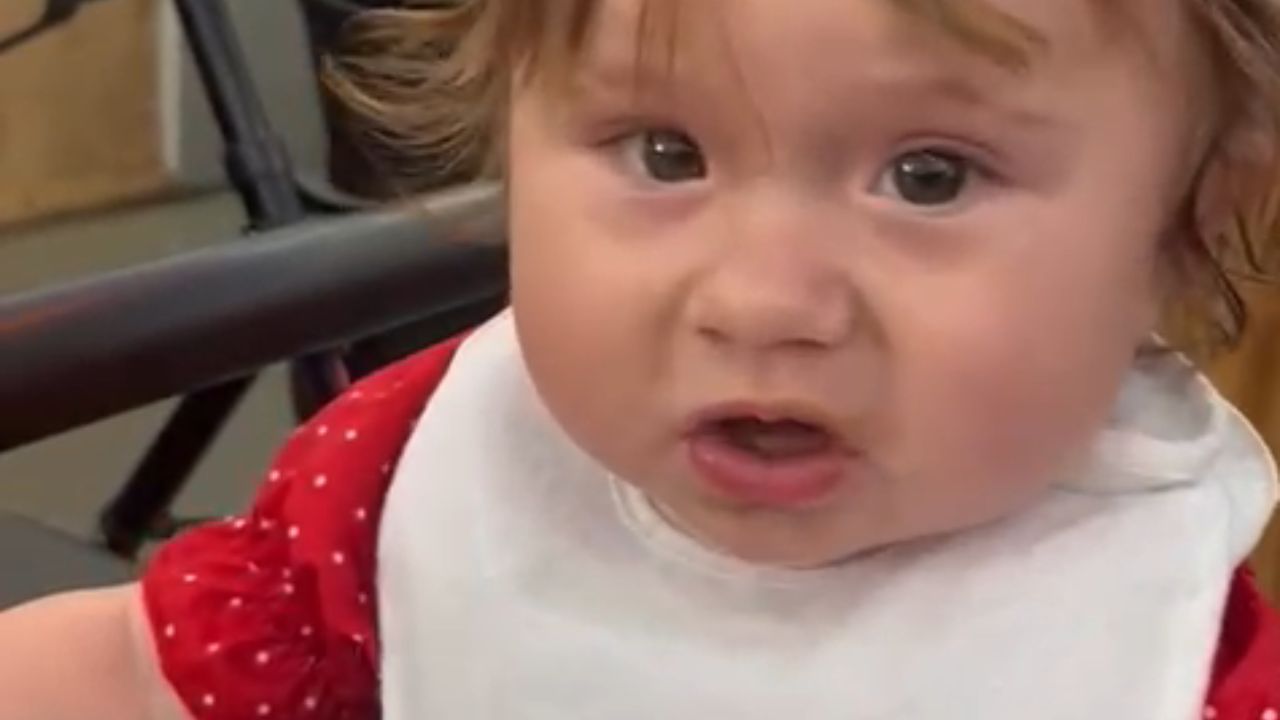 Little girl’s disappointment after tasting healthy greens during dinner ...