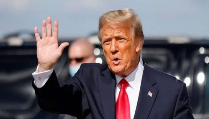 Trump says ships are 'starting to move out' of Hormuz after US, Iran ...