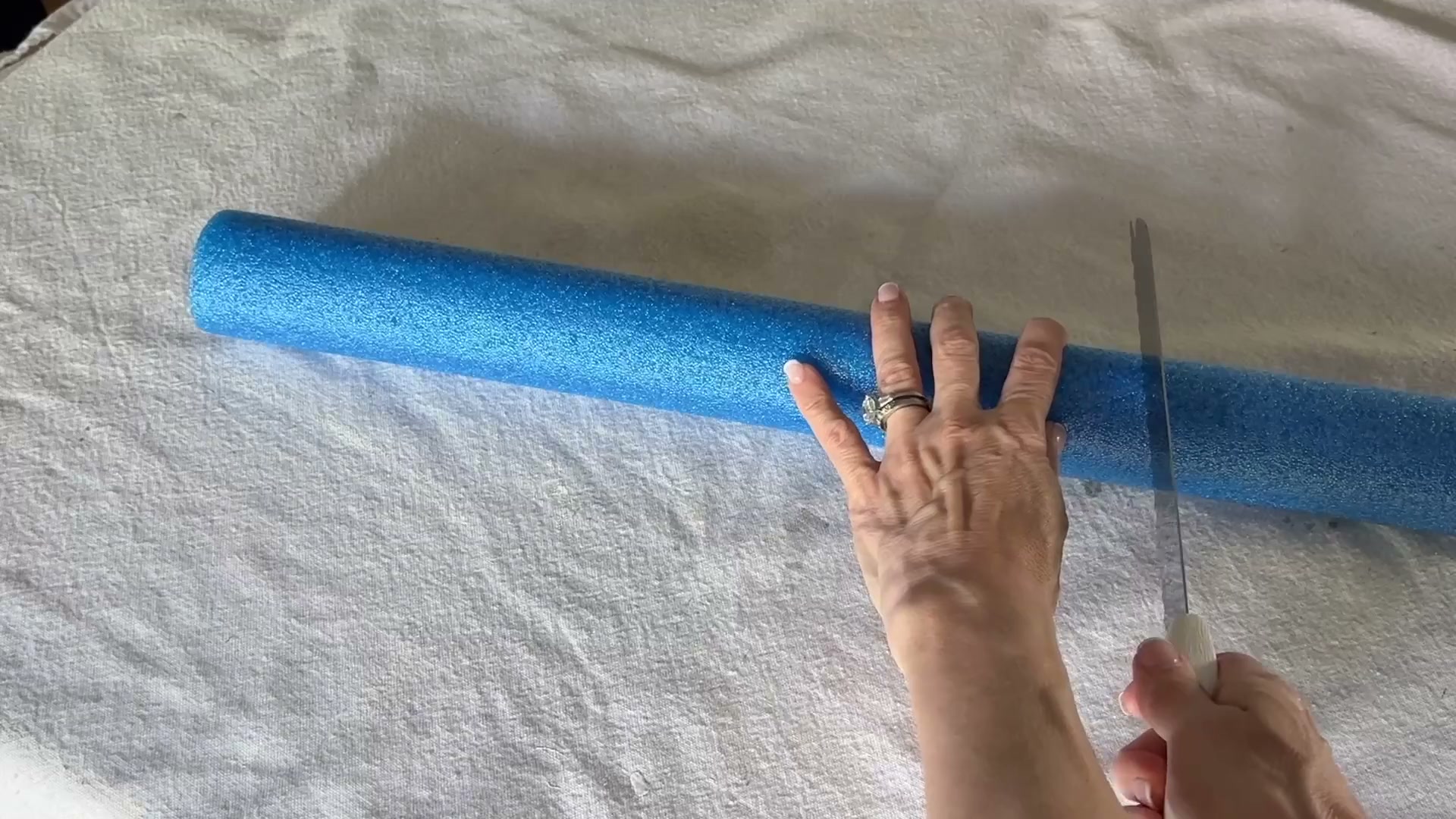 Stick a pool noodle into a tomato cage for this brilliant outdoor hack