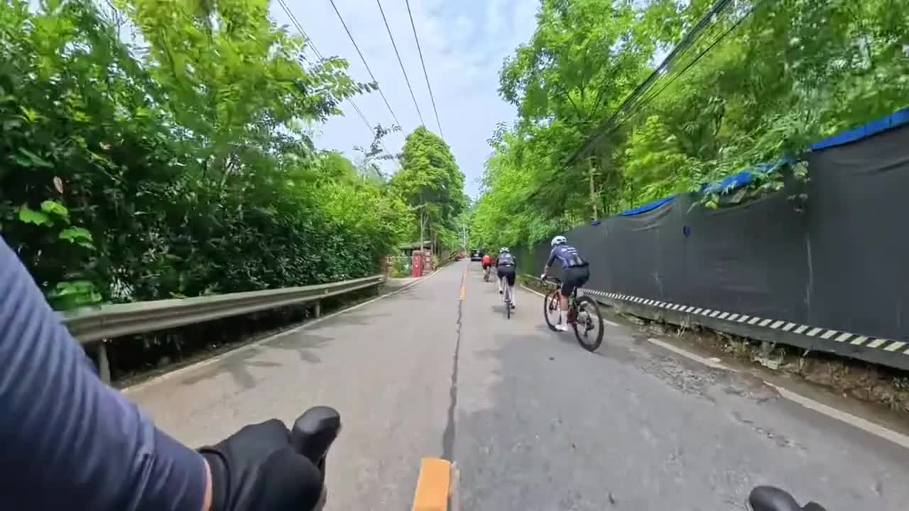 Tricycle crashes into roadside railings on curved downhill road in ...