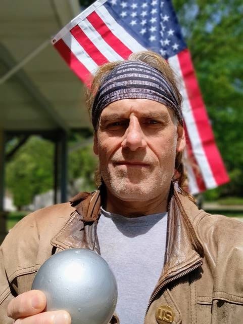 For America's birthday, Michigan swimmer to tow 250 cannonballs