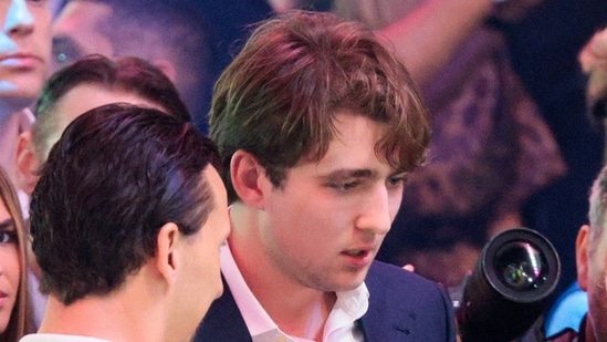 Barron Trump's grown-up new look steals spotlight at father's White ...