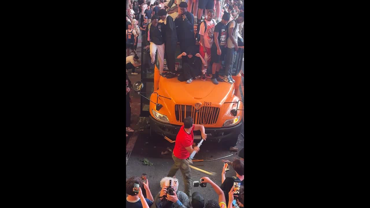 Man whacks school bus with scooter during New York Knicks celebrations