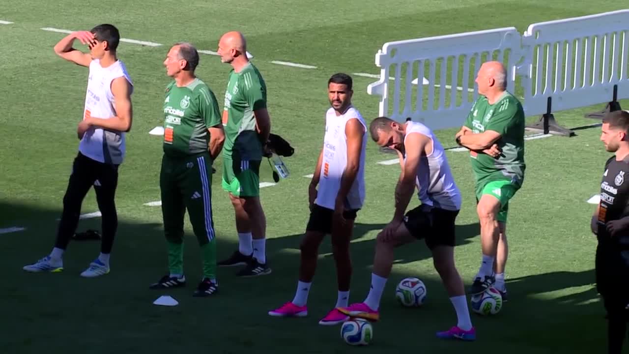 KU marching band gives Algeria's soccer team musical welcome for World Cup