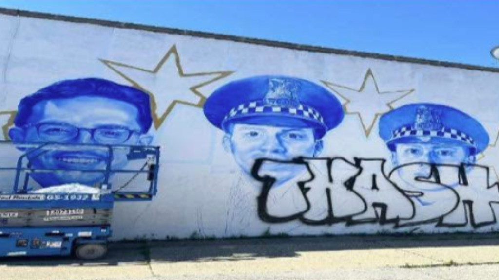 $1,000 reward offered after mural honoring fallen Chicago police ...