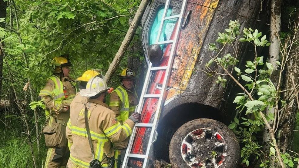 Greenfield crash leaves car nearly perpendicular to ground