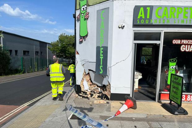 Car crashes into carpet shop - everything we know so far