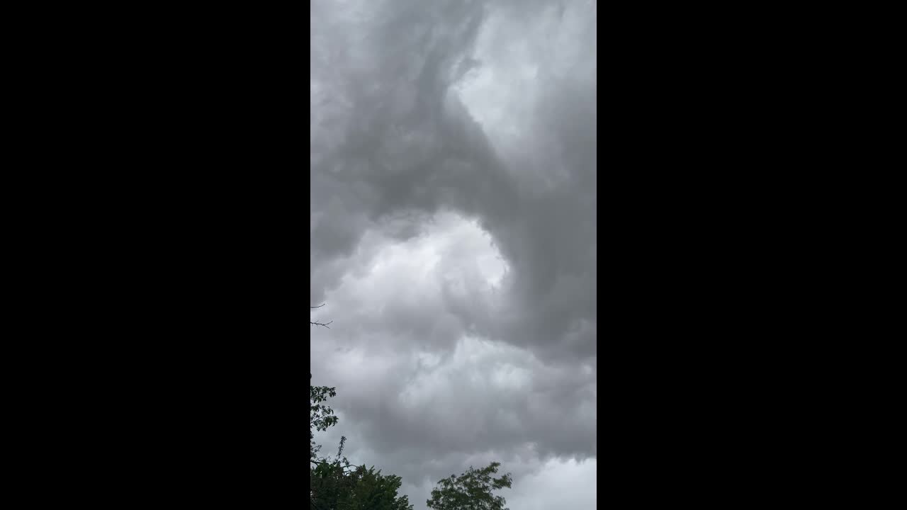 Rotating storm clouds swirl over Illinois home before tornadoes form nearby
