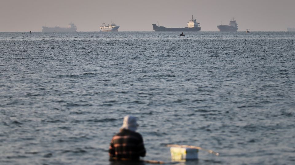Trump says the Strait of Hormuz is reopened but most ships are staying put